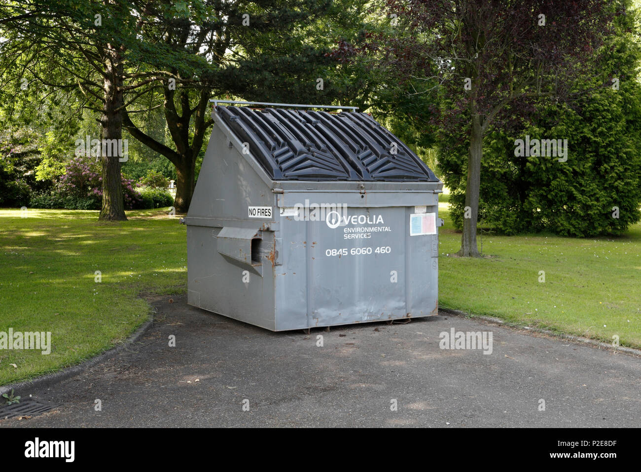 Large rubbish container bin in parkland Stock Photo - Alamy