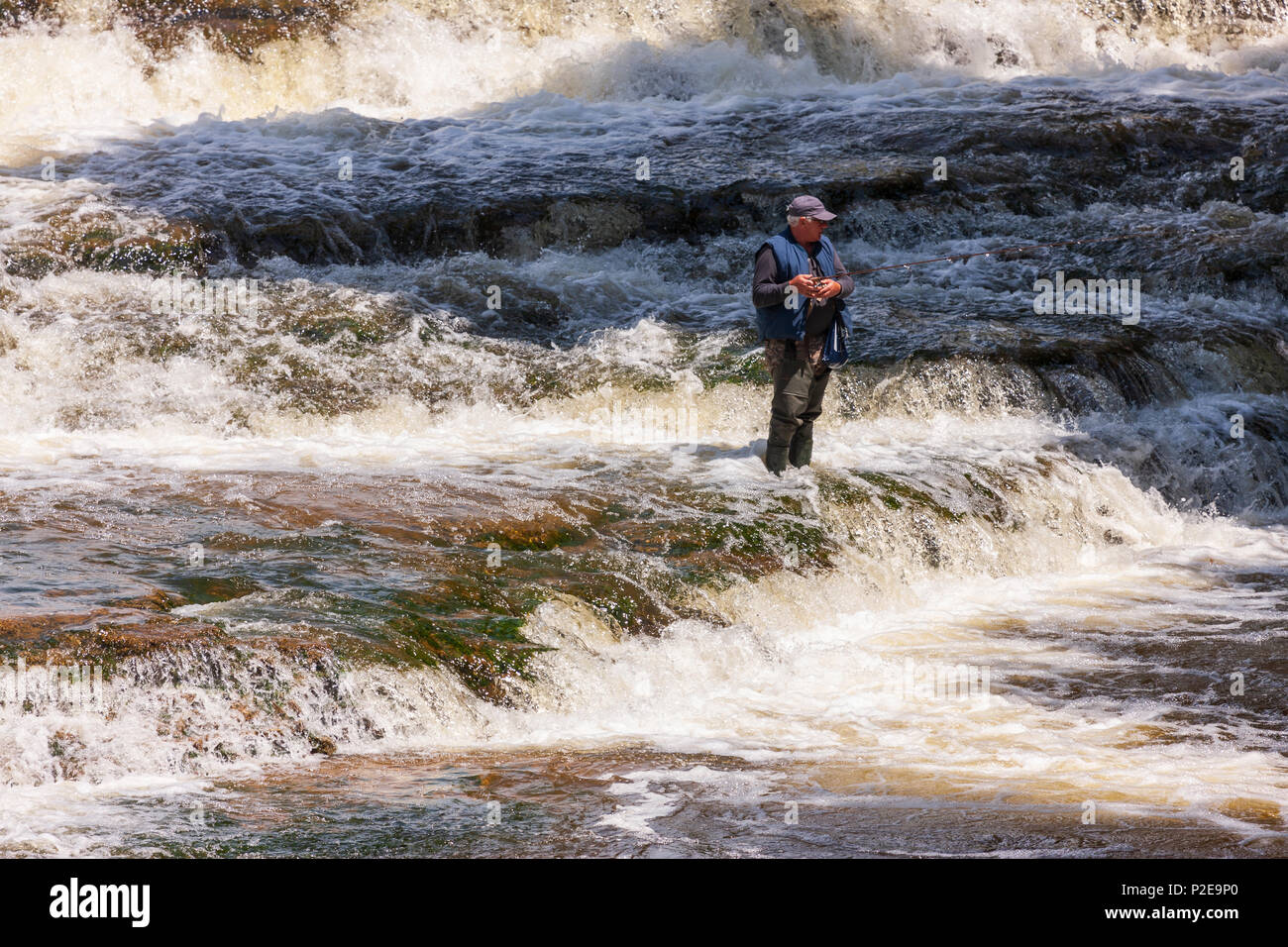 Hip waders hi-res stock photography and images - Alamy
