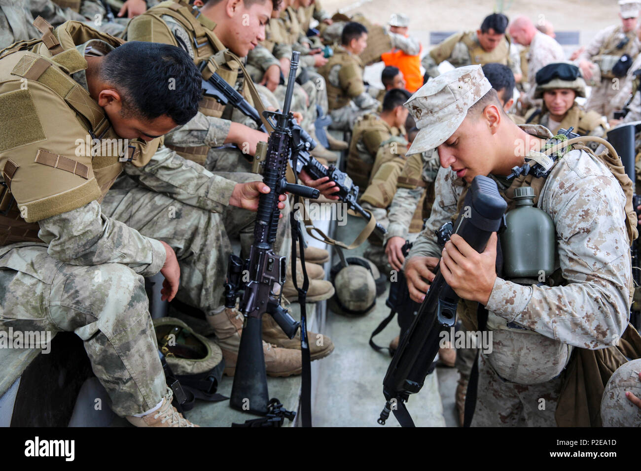 U.S. Marine Cpl. Tim Perez, a combat engineer with Task Force Koa Moana ...