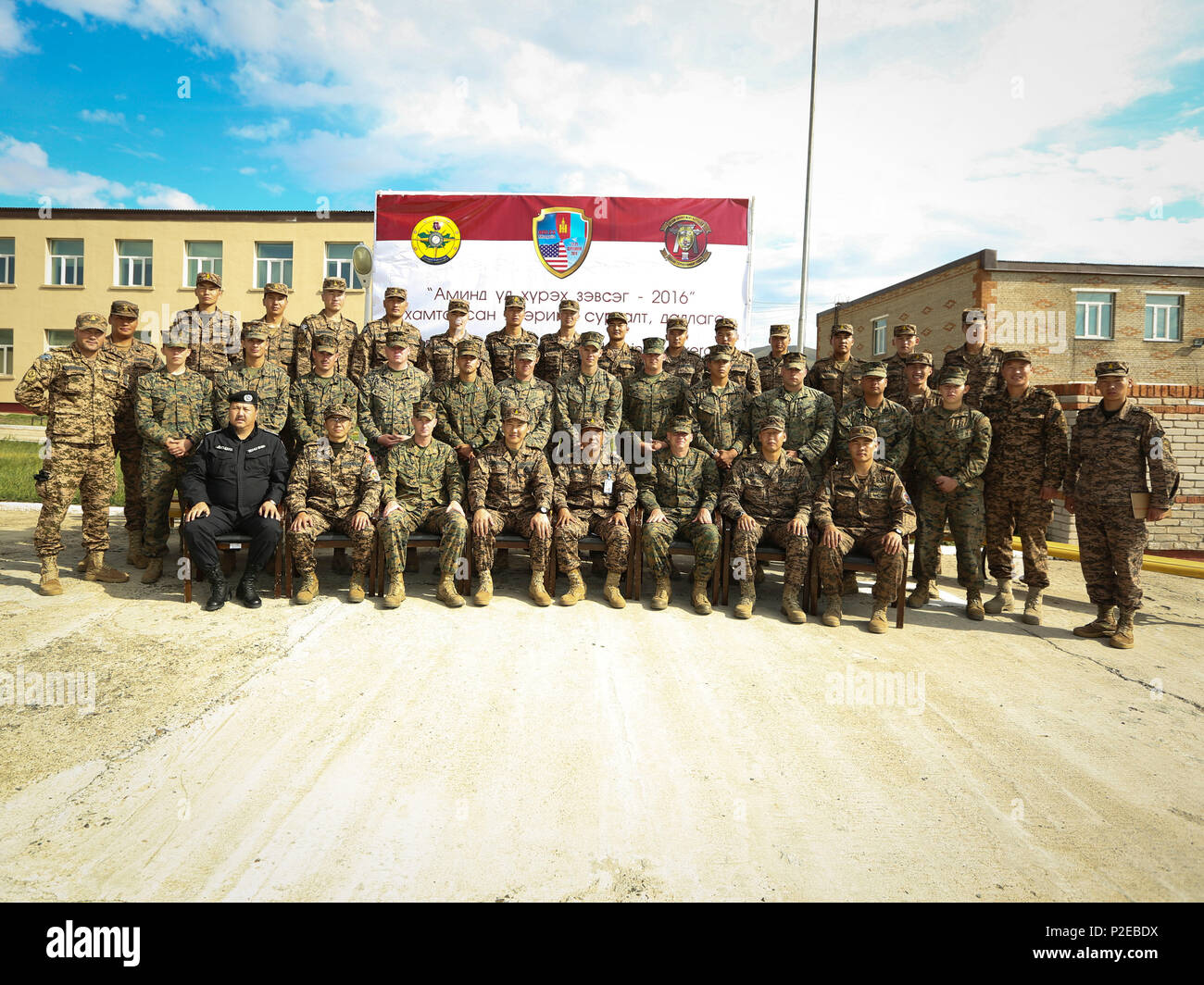 Mongolian Armed Forces members pose for a group photo with U.S. Marines ...