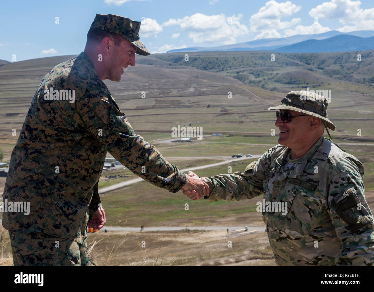 Lt. Col. Christopher Rogers, the Agile Spirit Exercise Director, greets ...