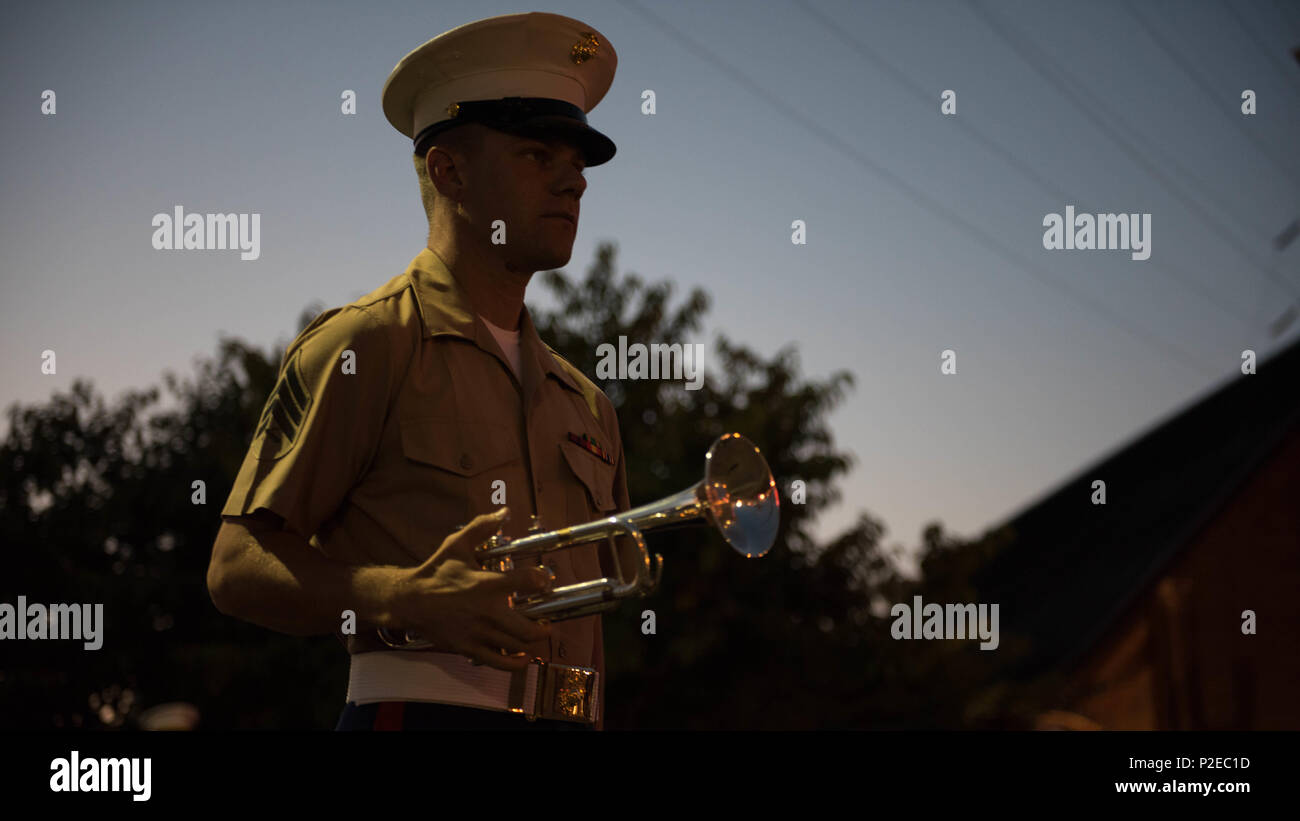 Sgt. Taylor Massey, bugler from Marine Band San Diego stands at ...