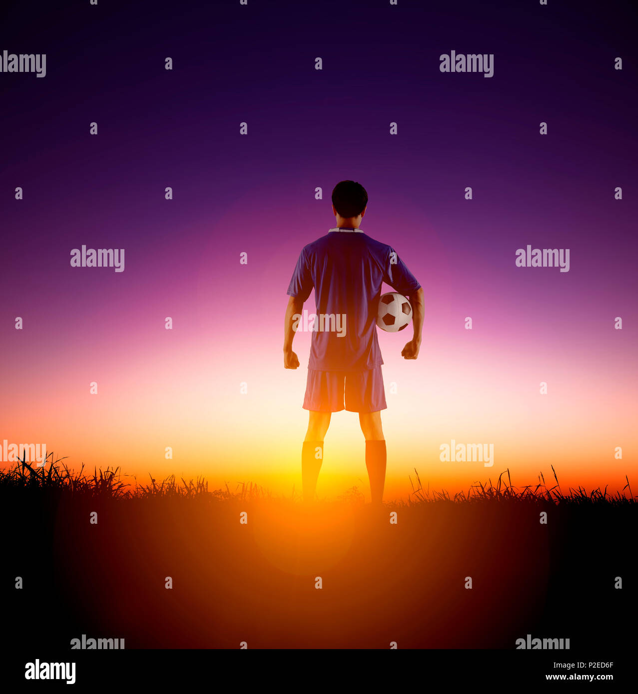 rear view soccer football player watching the sunrise Stock Photo - Alamy