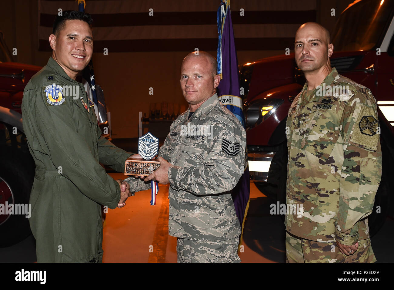 U.S. Air Force Tech. Sgt. Justin M. Williams (center), 612th Air Base ...