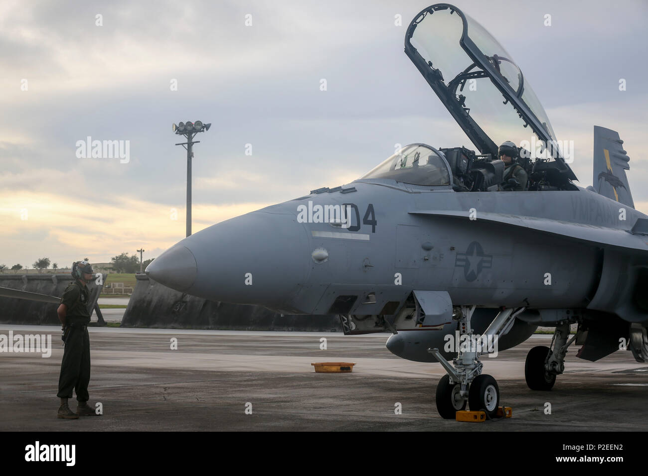 U.S. Marine Corps Lance Cpl. Charles Olivas the plane captain with ...