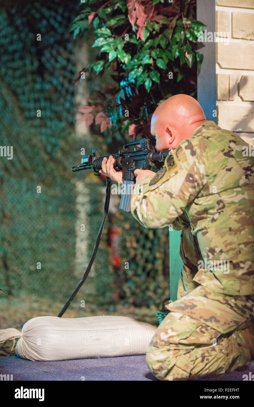 U.S. Army Staff Sgt. Paul Lamb, a Military Policeman assigned to United ...