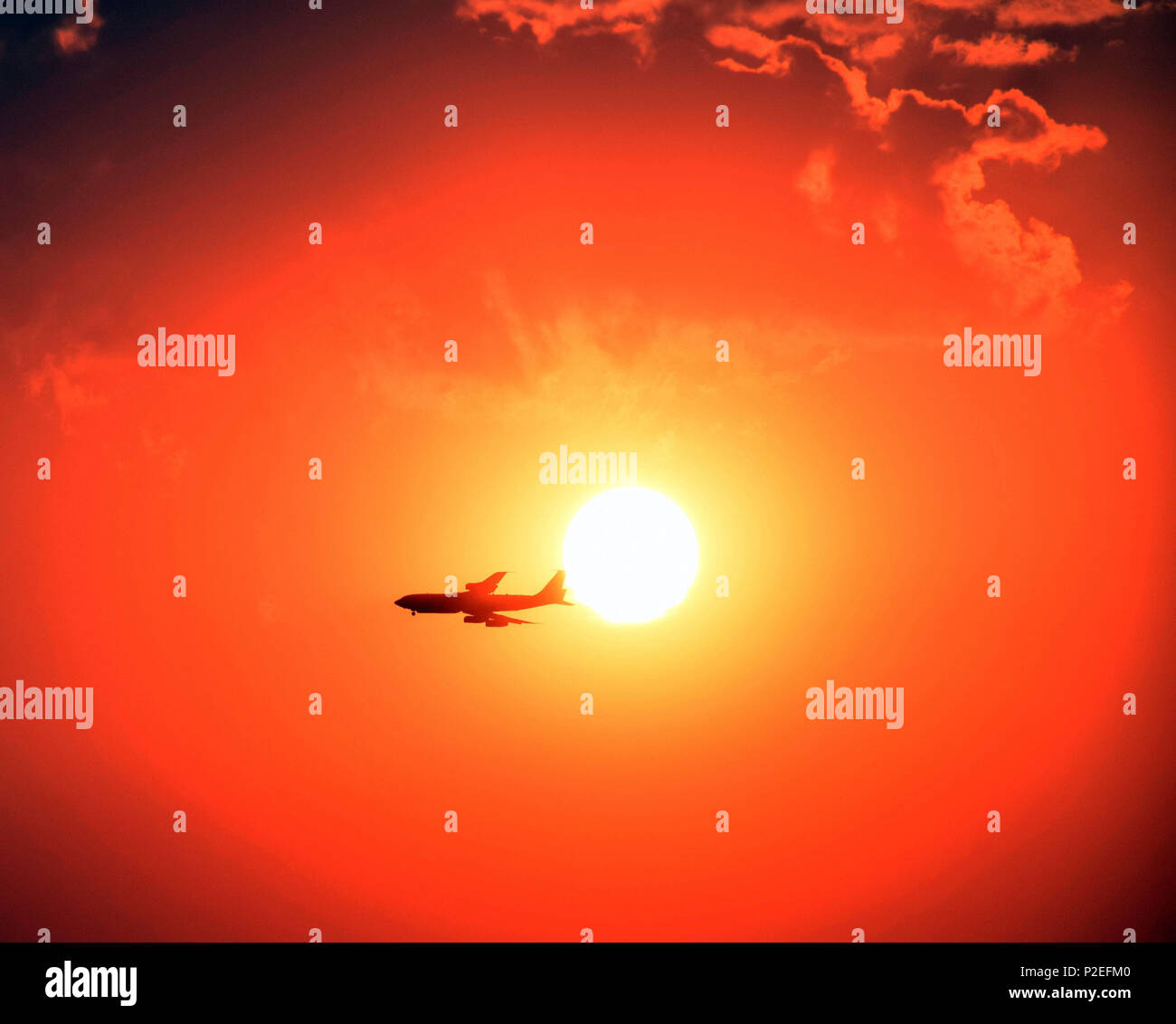 An E-8C Joint Surveillance Target Attack Radar System returns at sunset ...