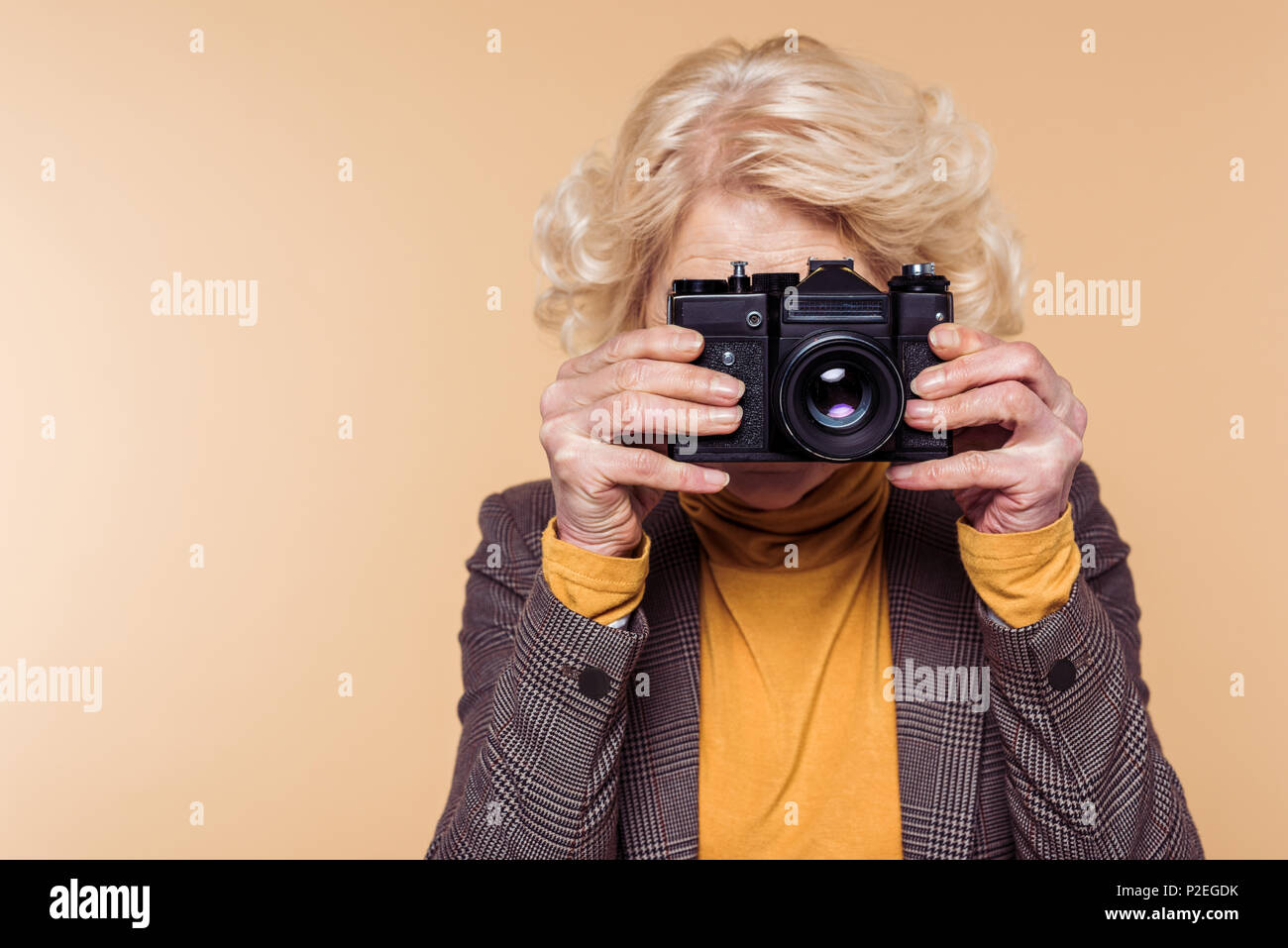 Female photographer shooting vintage hi-res stock photography and ...