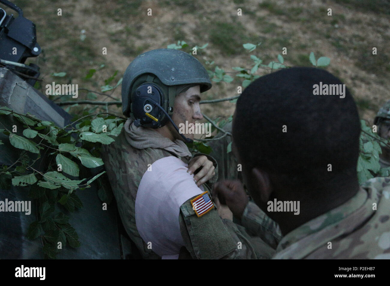 A U.S. Soldier, right, of Romeo Company, 2nd Battalion, 7th Infantry ...