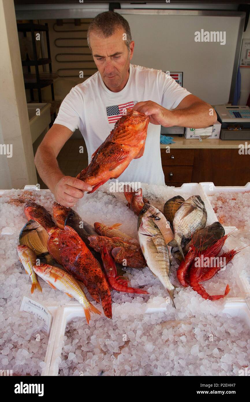 Italy, Puglia, Monopoli, A fishmonger stall, on the port Stock Photo ...