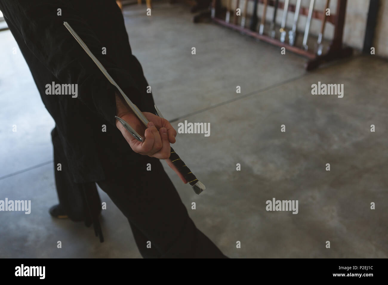 Kung fu fighter practicing with sword Stock Photo - Alamy