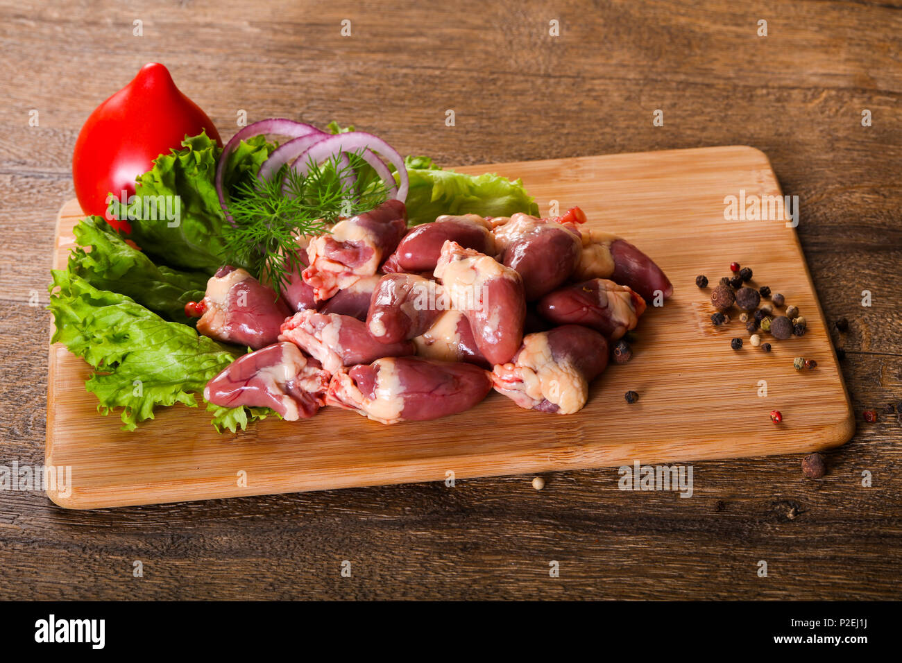 Raw chicken hearts for cooking Stock Photo - Alamy