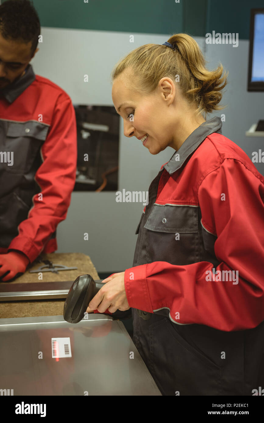 Female worker scanning a bar code Stock Photo - Alamy Female worker scanning a bar code Stock Photo - Alamy