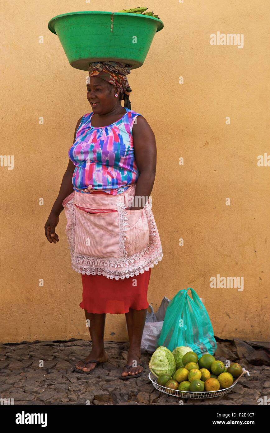Cape Verde, Fogo, Sao Filipe, Street vendor with a bowl of fruits on ...