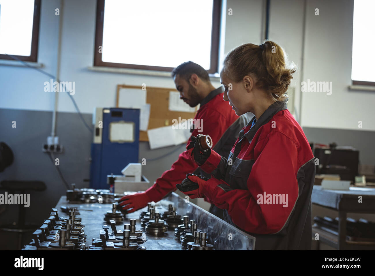 Checking machine parts hi-res stock photography and images - Alamy