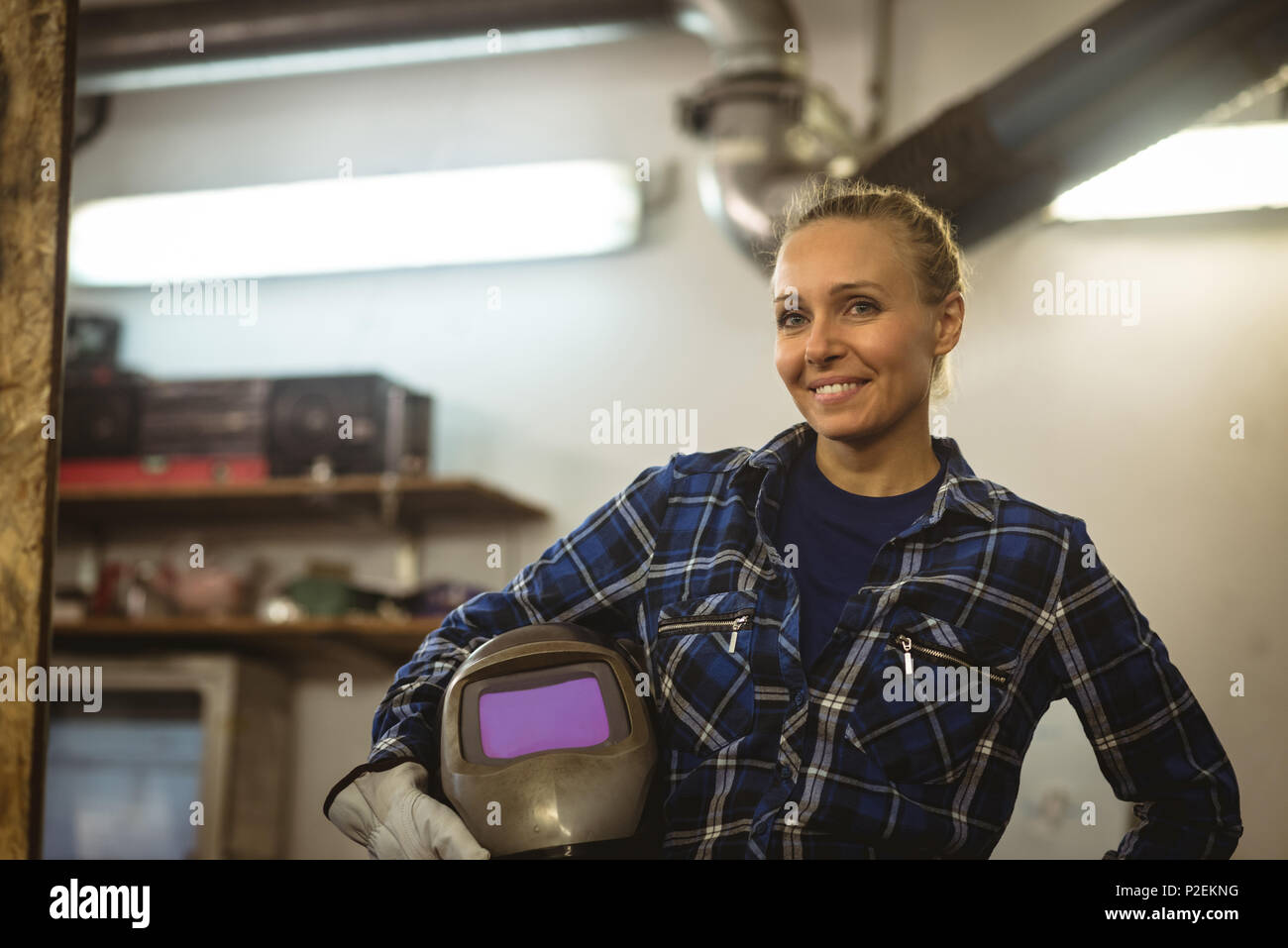 Production worker helmet hi-res stock photography and images - Alamy