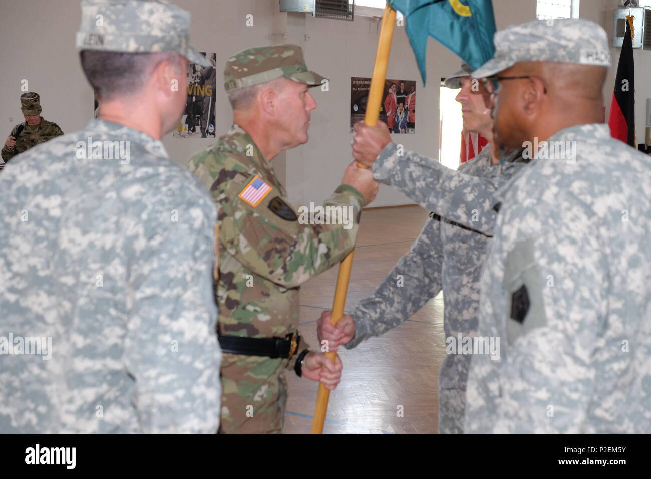 WACKERNHEIM, Germany — Col. John E. Dethlefs, right, takes the guideon ...