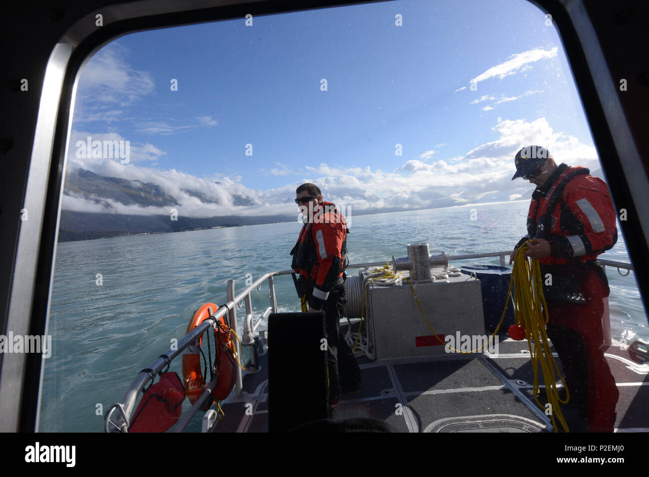 Petty Officer 3rd Class John Gerbrands (left) and Fireman Ryan Tyler ...