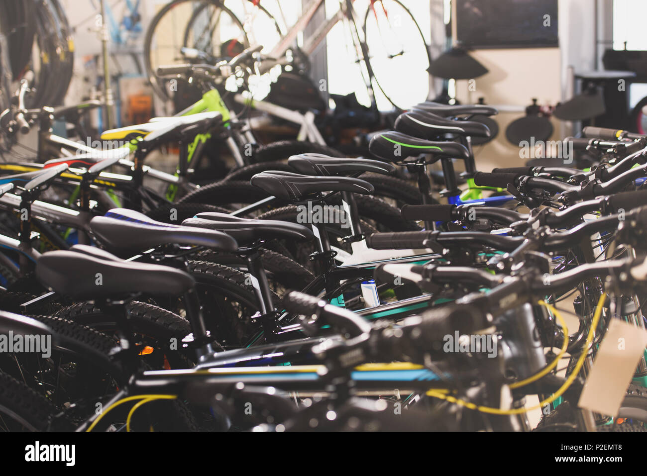 seats of bicycles selling in bike shop Stock Photo - Alamy