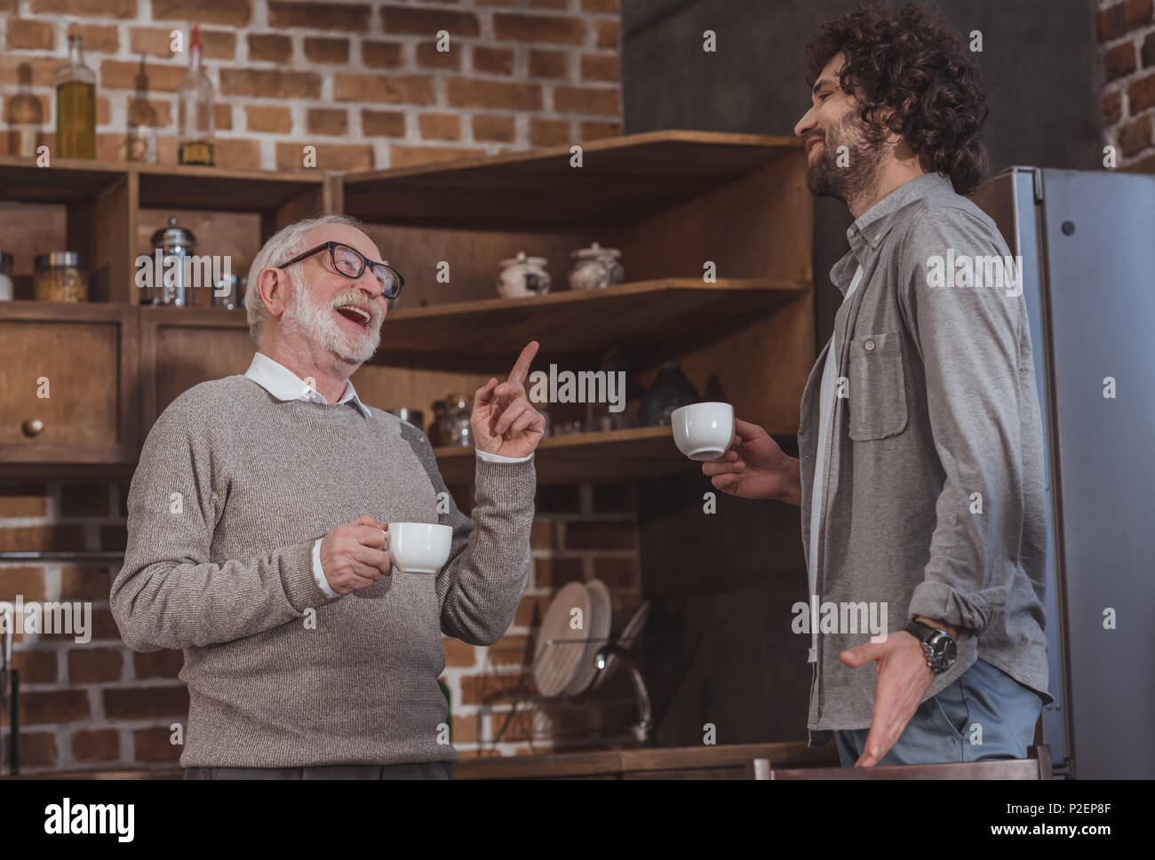 Dad and son talking laughing hi-res stock photography and images - Alamy