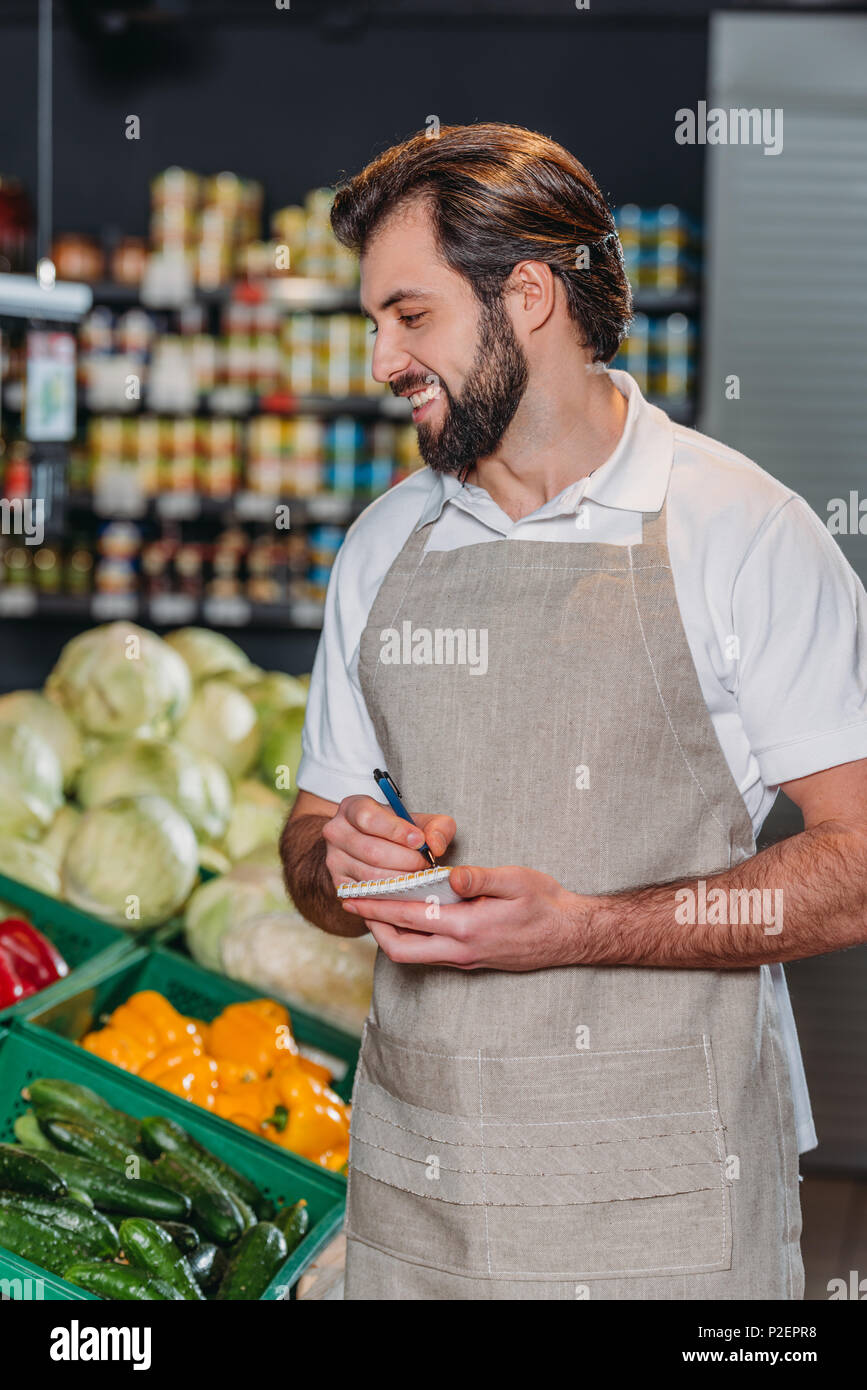 Smiling shop assistant hi-res stock photography and images - Alamy