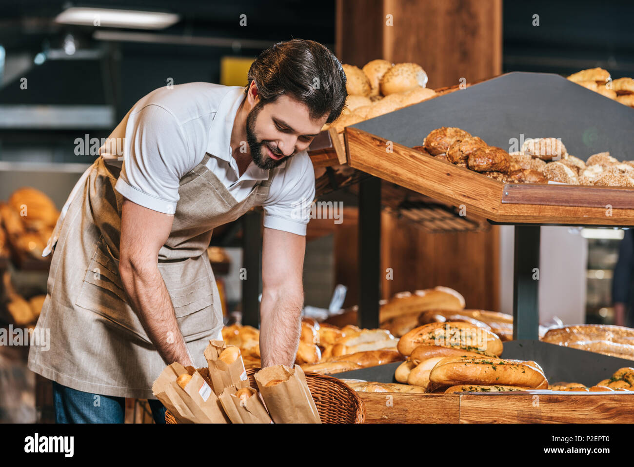 Male shop assistant clothes shop hi-res stock photography and images ...