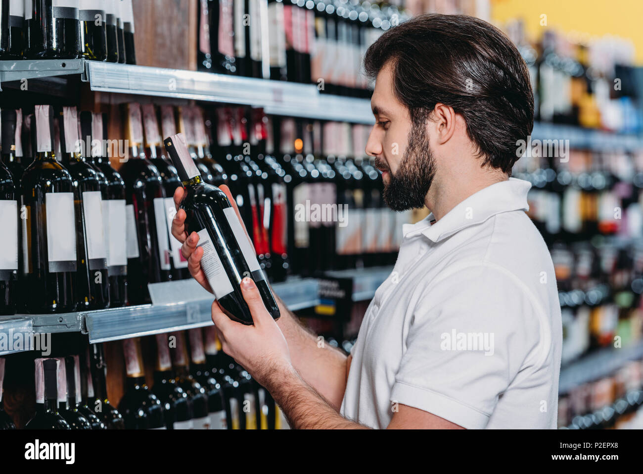 Male shop assistant clothes shop hi-res stock photography and images ...