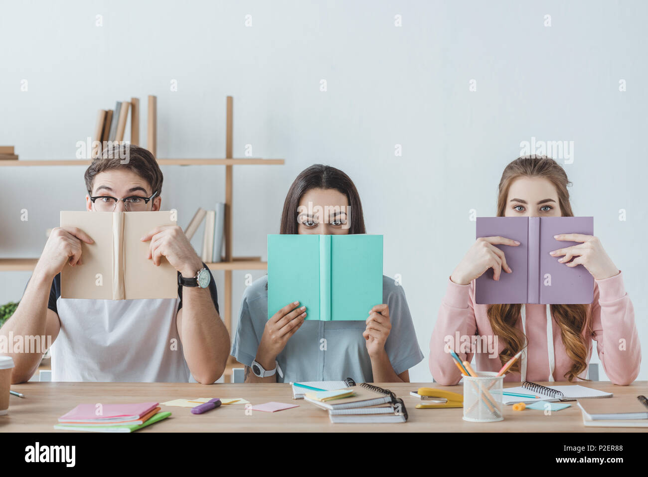 Hold copybooks hi-res stock photography and images - Alamy