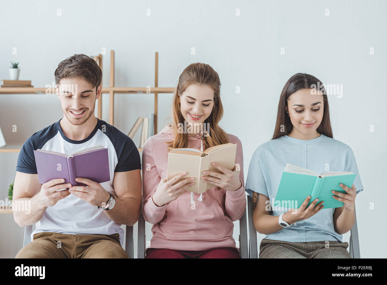 Reading books together hi-res stock photography and images - Alamy