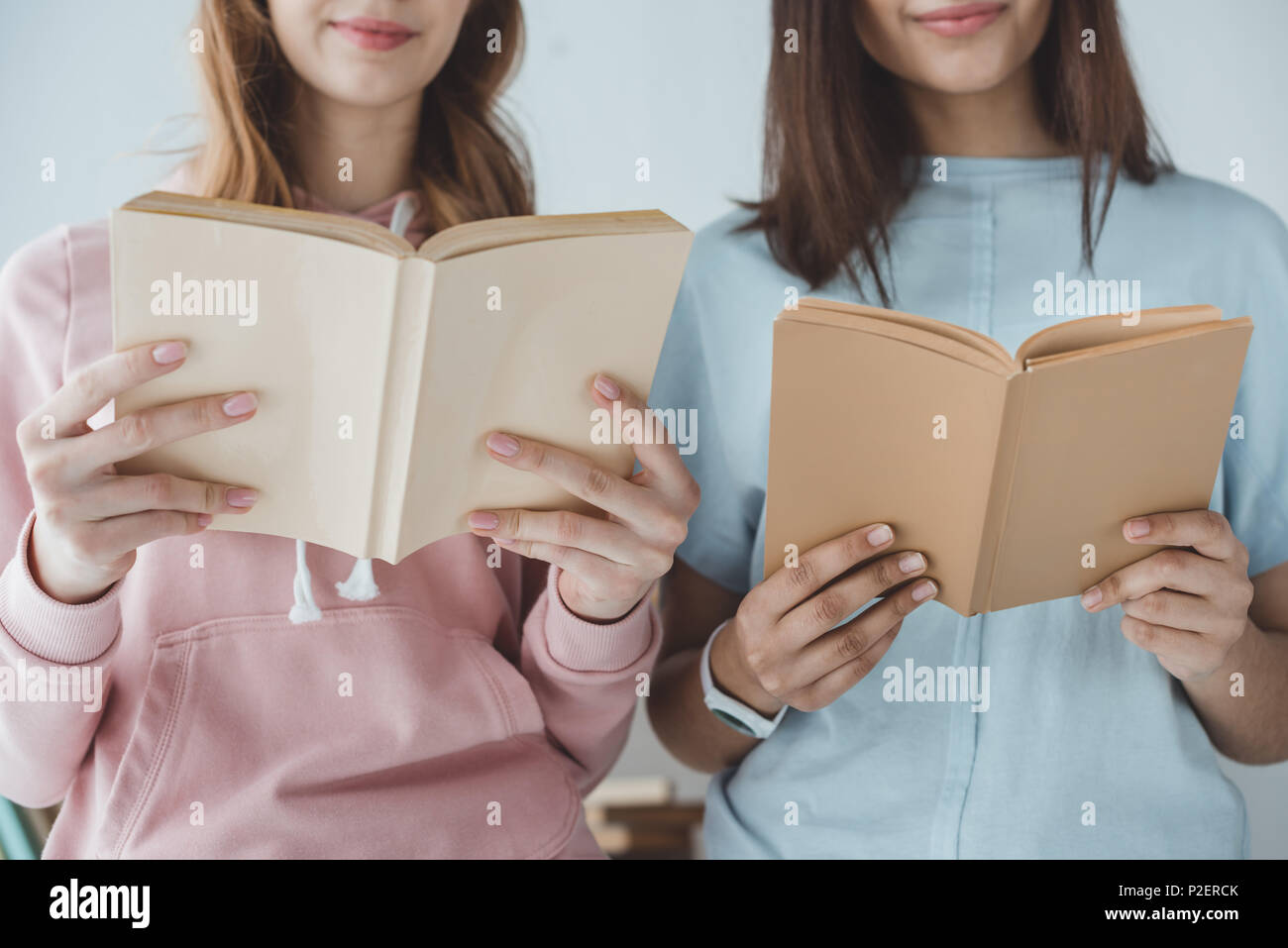 Reading books together hi-res stock photography and images - Alamy
