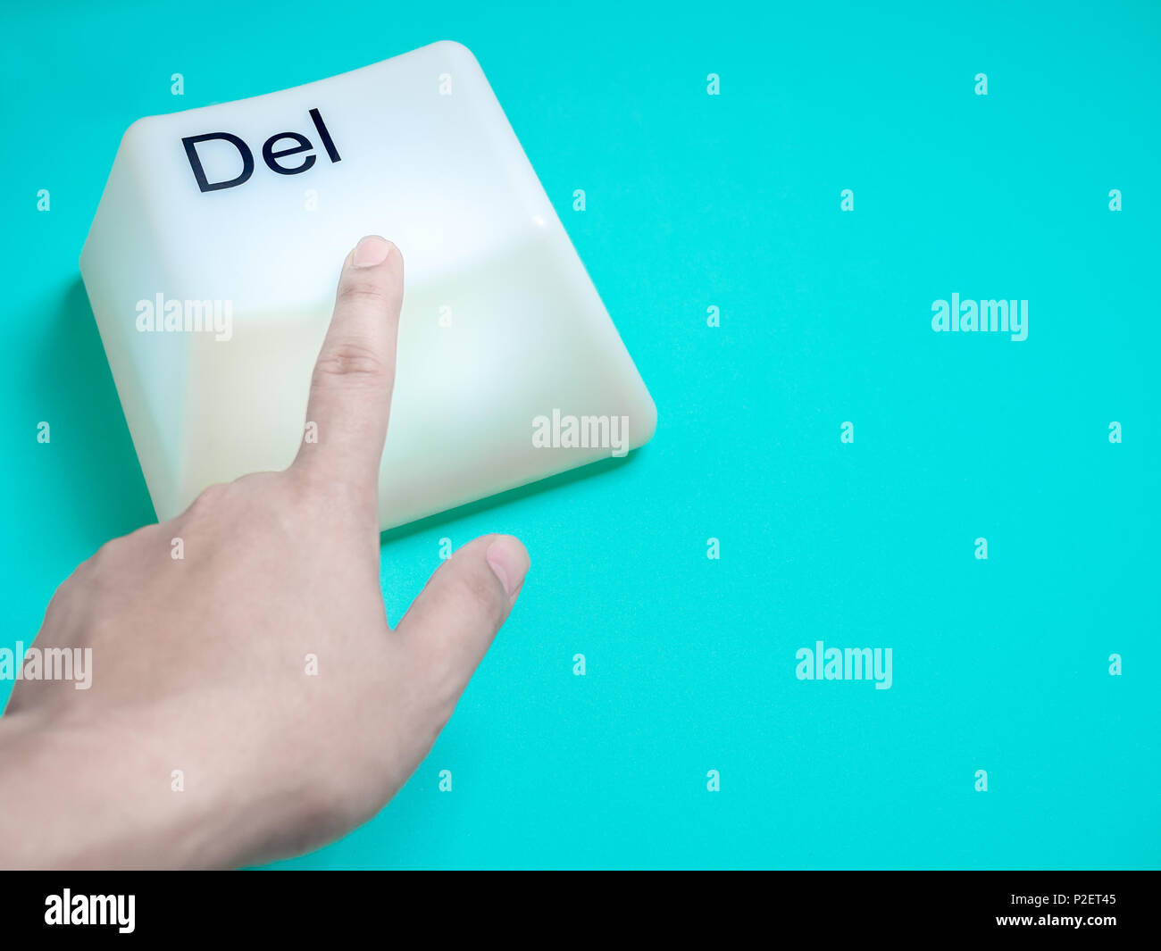 Finger is Pressing Big Delete Computer Key Button Light Box Isolated on ...