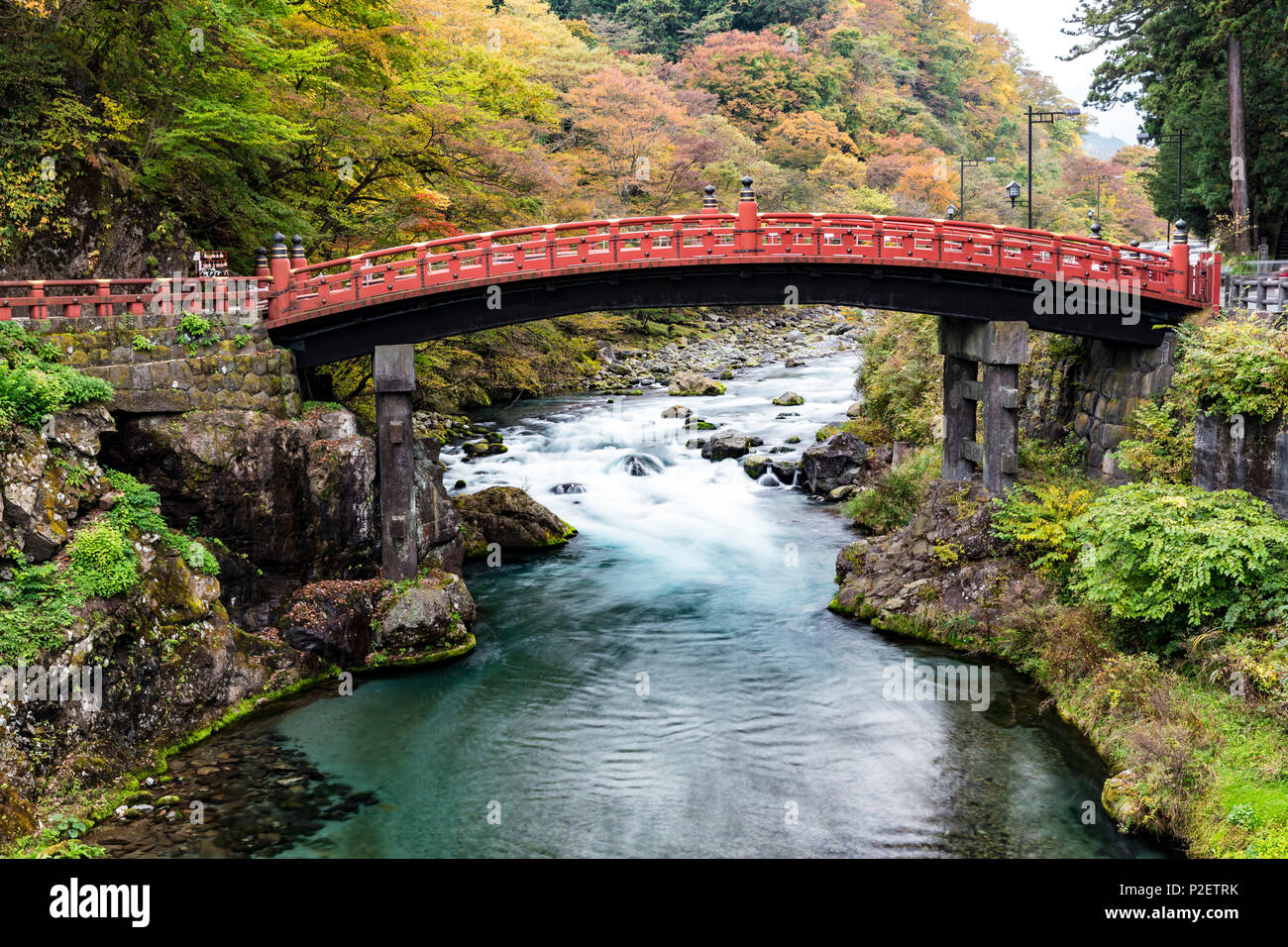 Wooden red bridge named Shinkyo over river Daiya in Nikko, Tochigi ...