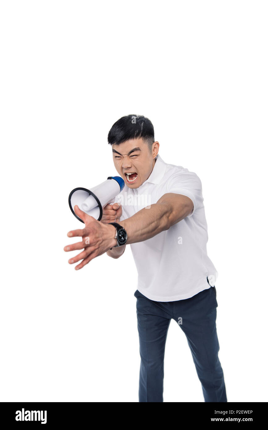 portrait of angry asian man with bullhorn and outstretched arm isolated ...