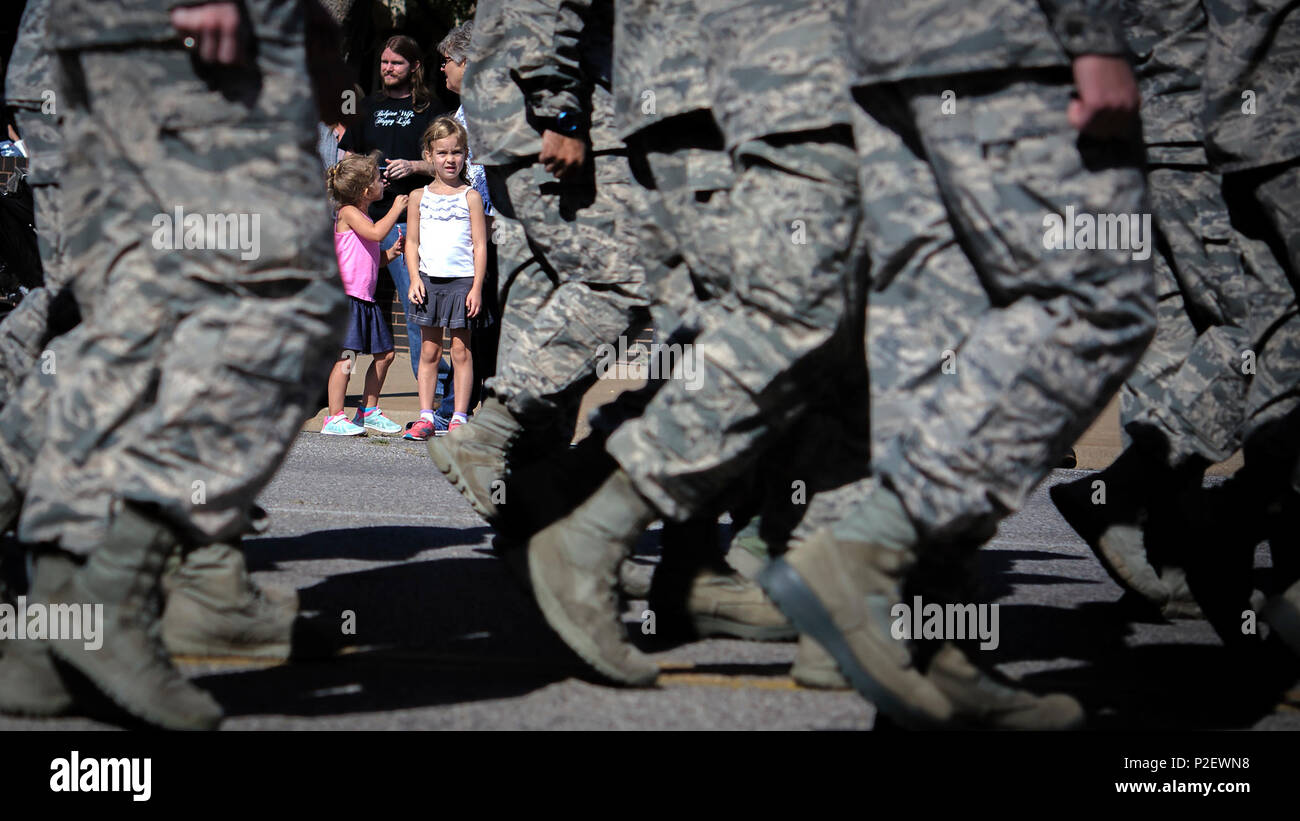 A local kid watches Vance Air Force Base Airmen march in Enid, Oklahoma ...
