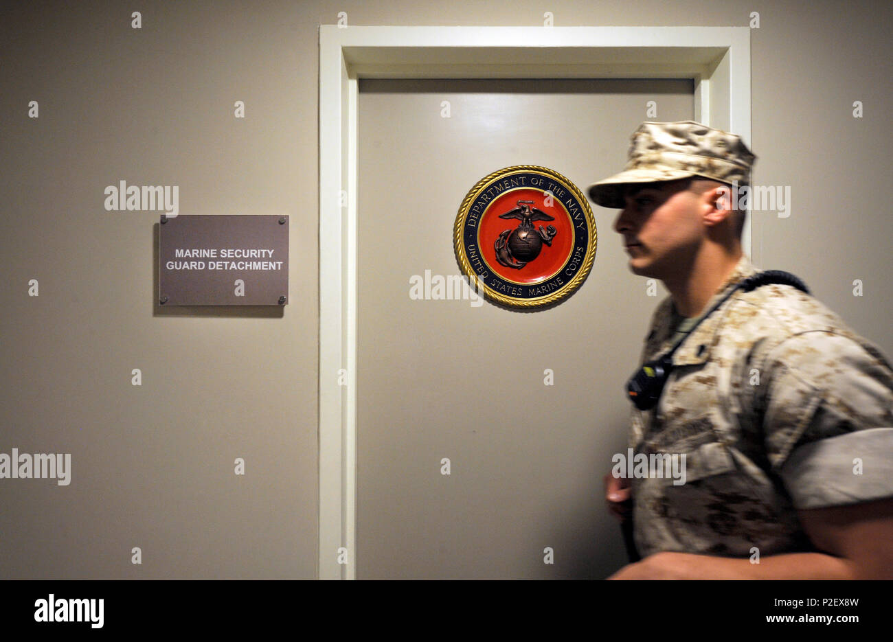 U. S. Marine Sgt. Jon Montoto, a Marine Security Guard, patrols a ...