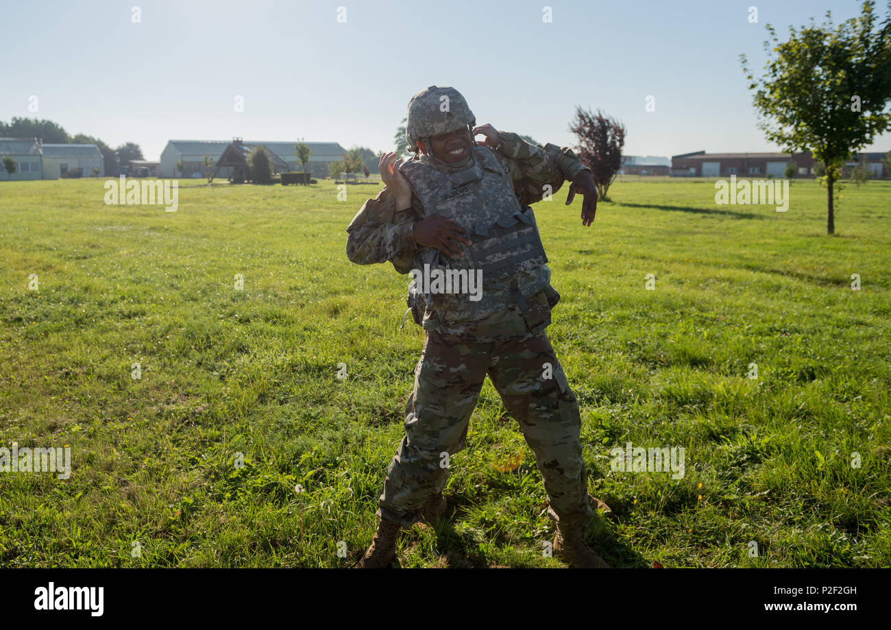 U.S. Army Sgt. Jerrell Knight performs a transition to the back on Sgt ...