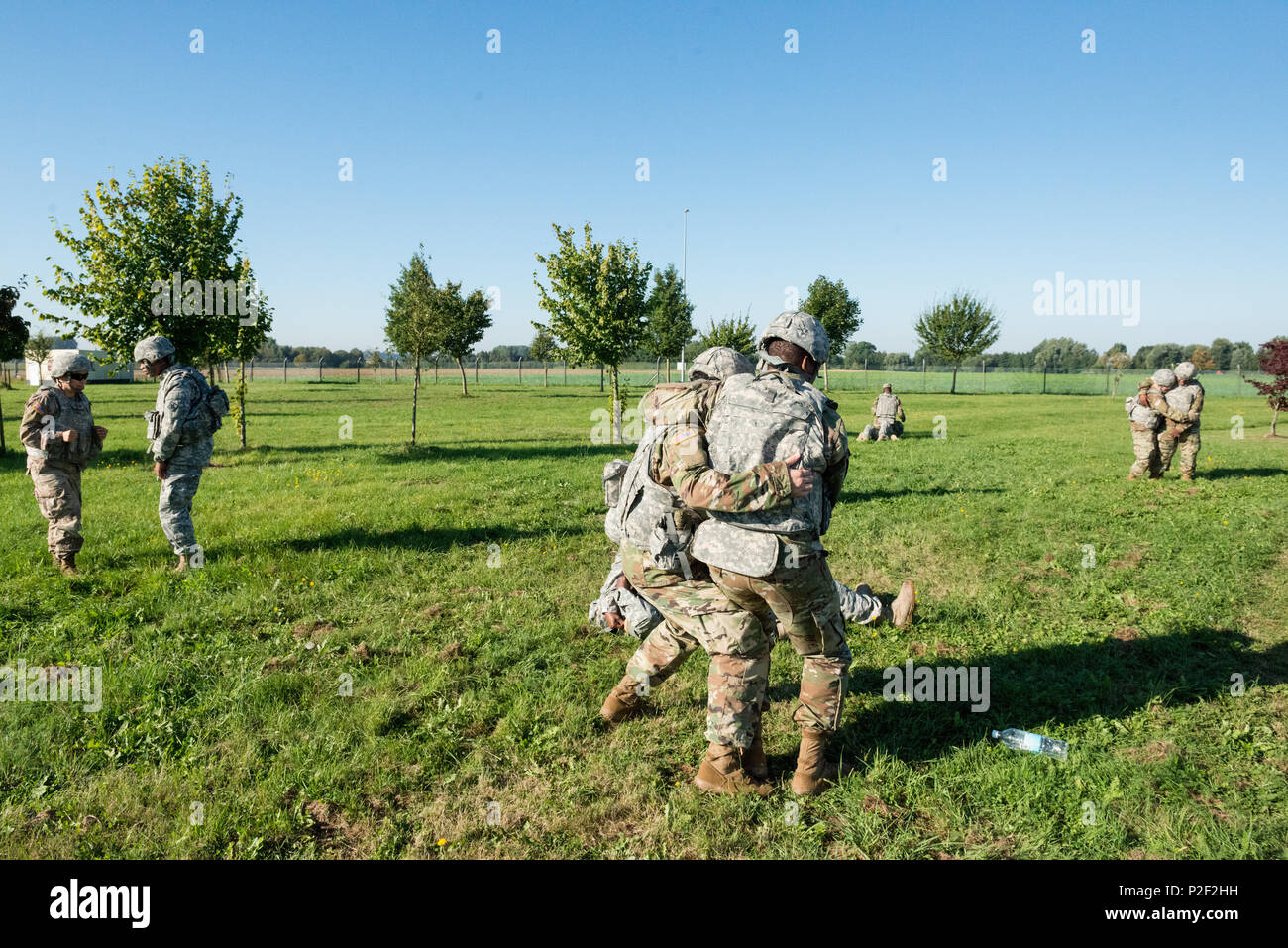 U.S. Soldiers with 128th Signal Company grapple as they practice the ...