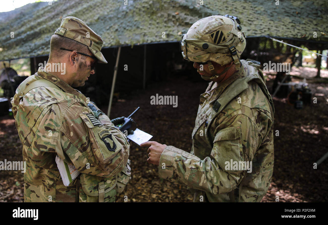 U.S. Army Cpt. Shaun Futch, left, of the Timberwolf Team, Joint ...