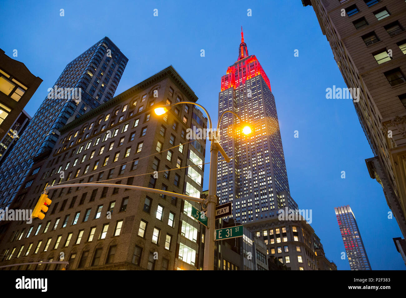 5th Avenue, 5, E 31 Street, corner, Empire State Building, twilight ...
