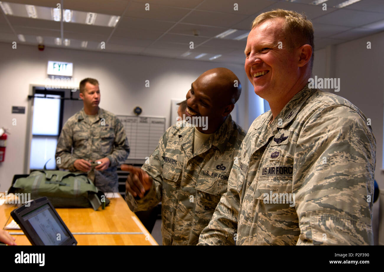 U.S. Air Force Col. Joseph McFall, 52nd Fighter Wing commander, right ...