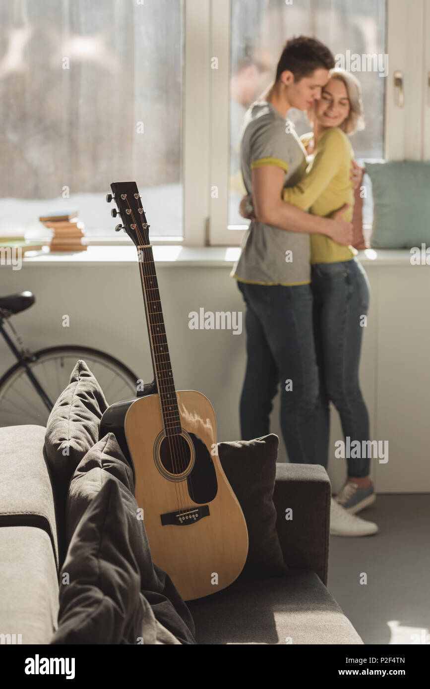 Hugging guitar hi-res stock photography and images - Alamy