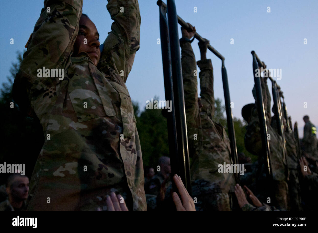 Soldiers attending Basic Combat Training conduct physical fitness ...