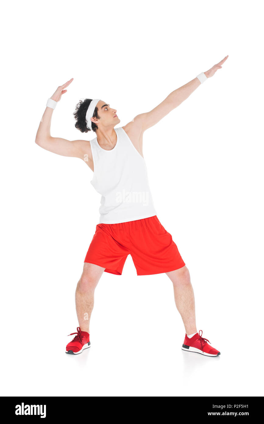 Profile of young thin sportsman doing exercise isolated on white Stock ...