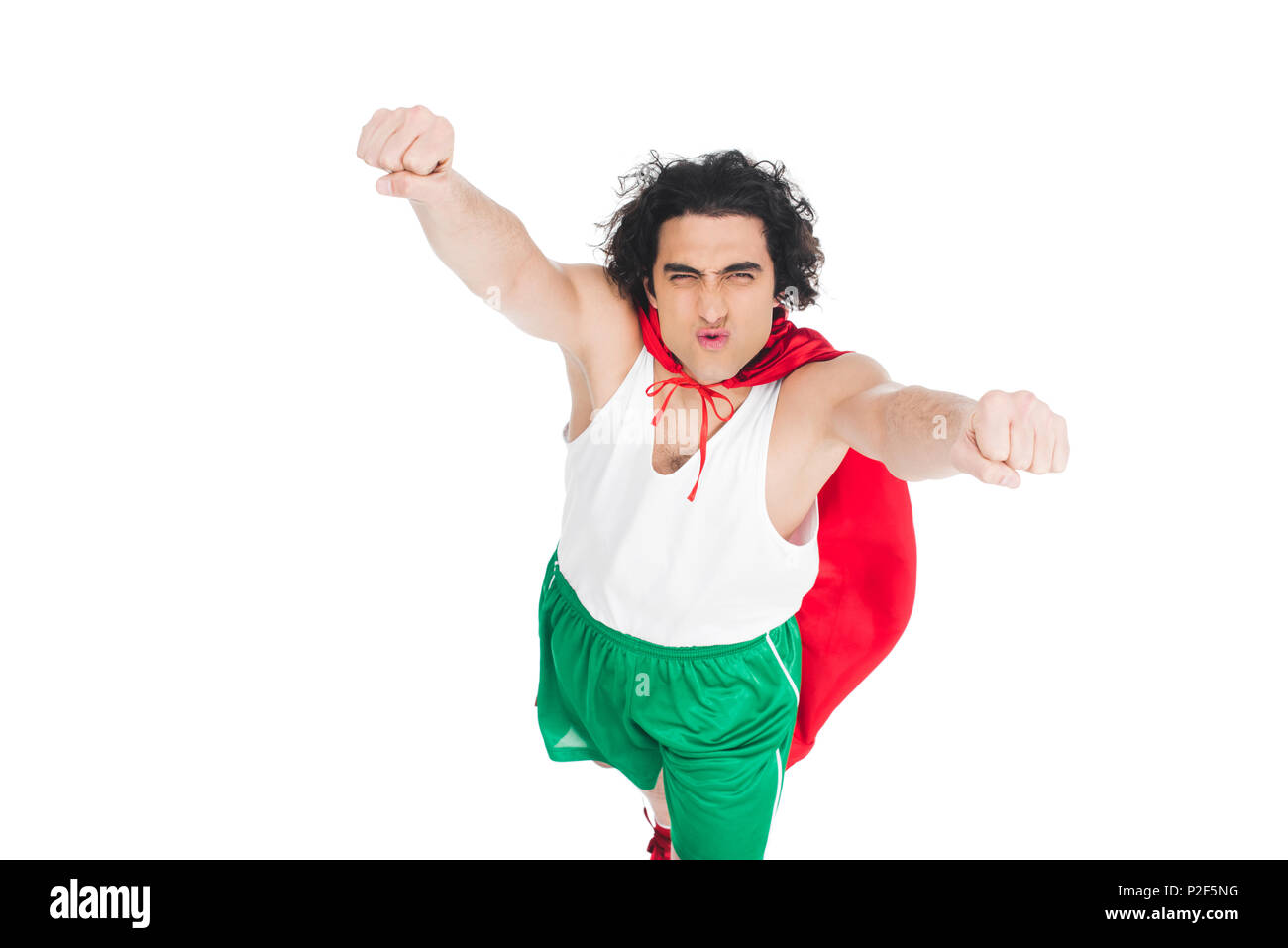 Superhero in red cape depicting flying isolated on white Stock Photo ...