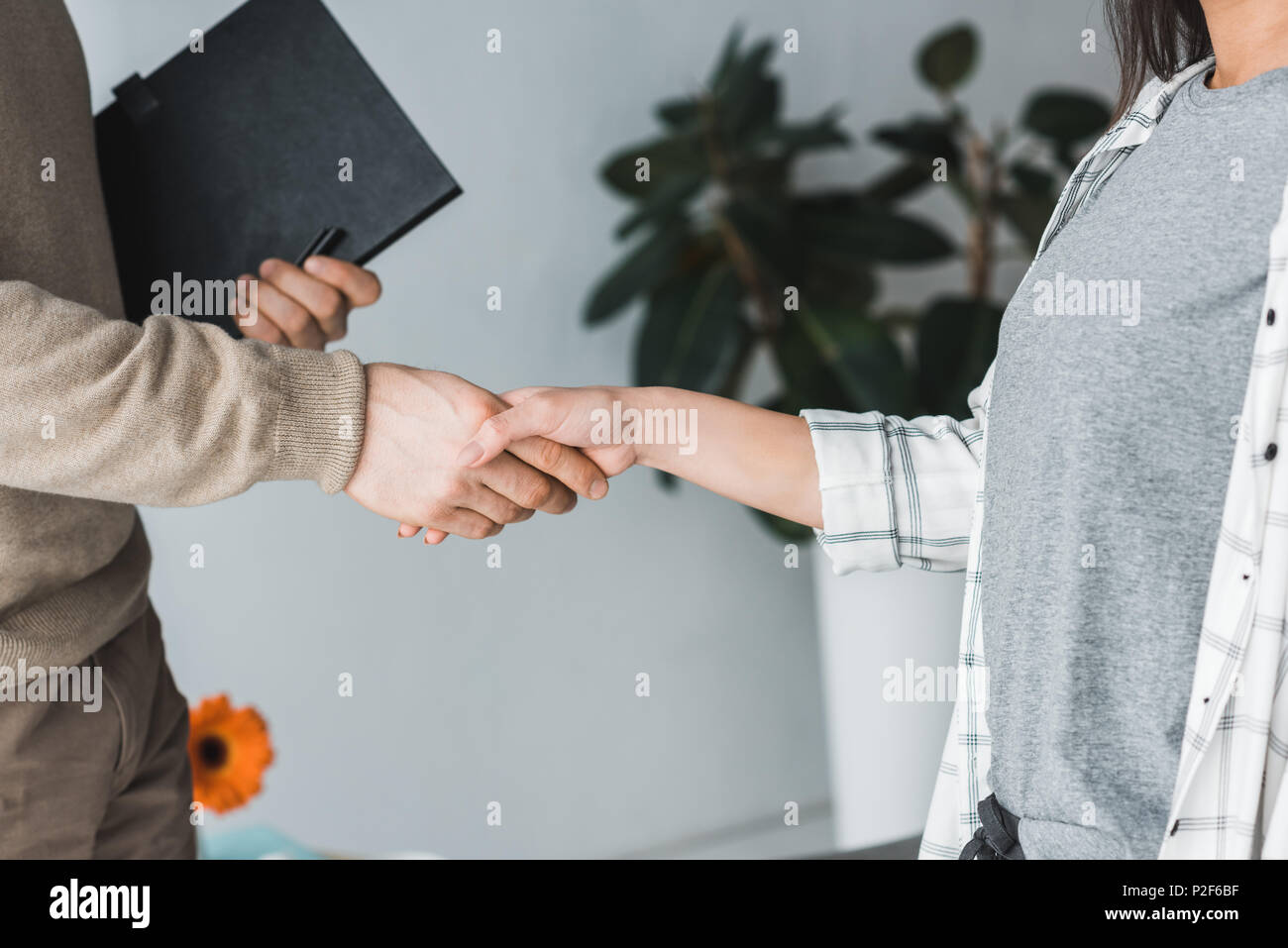 Psychologist and patient shaking hands hi-res stock photography and ...