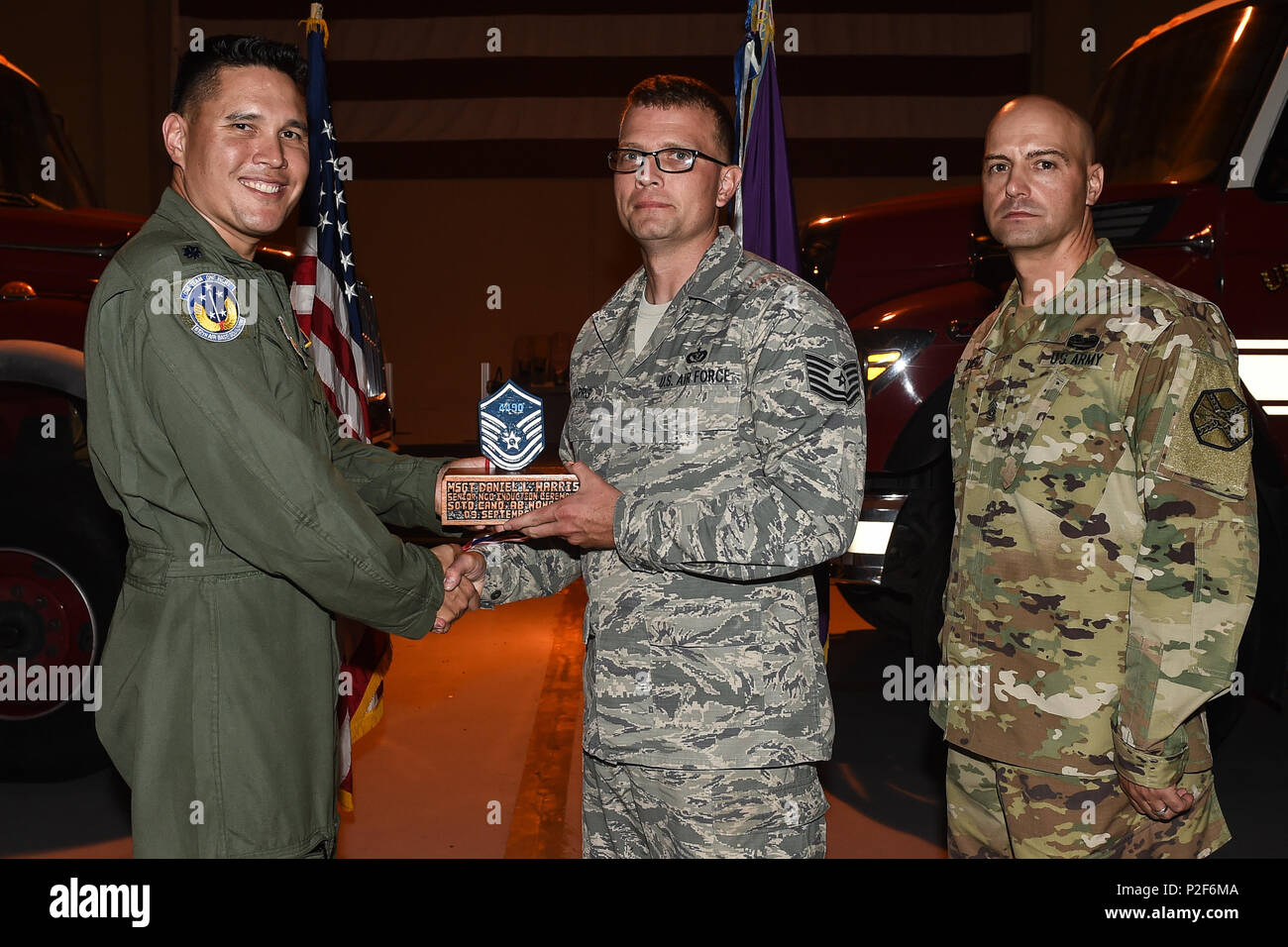 U.S. Air Force Tech. Sgt. Daniel L. Harris (center), 612th Air Base ...