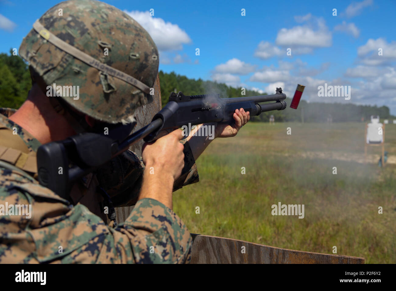 Cpl. Joshua Hodel, Stone Bay target shed noncommissioned officer in charge, fires a Benelli M4 ...