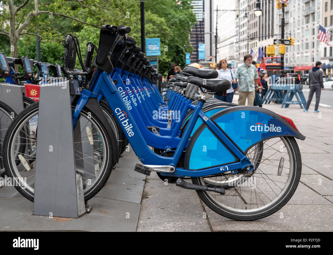Row of bright blue bikes in Citi bike sharing scheme Stock Photo - Alamy