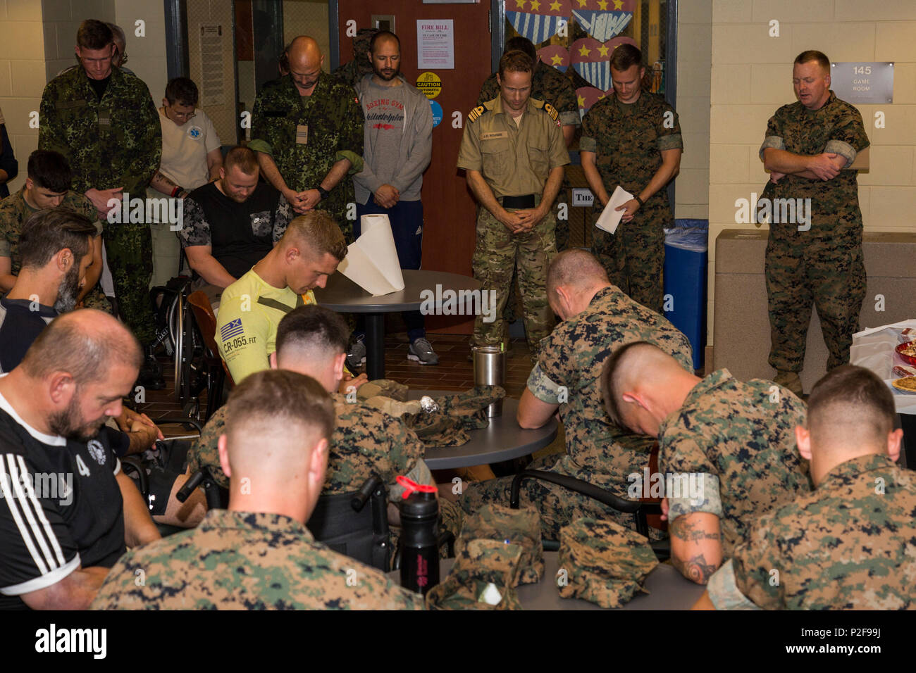 U.S. Navy Lt. John Jones, right, chaplain, Wounded Warrior Battalion ...
