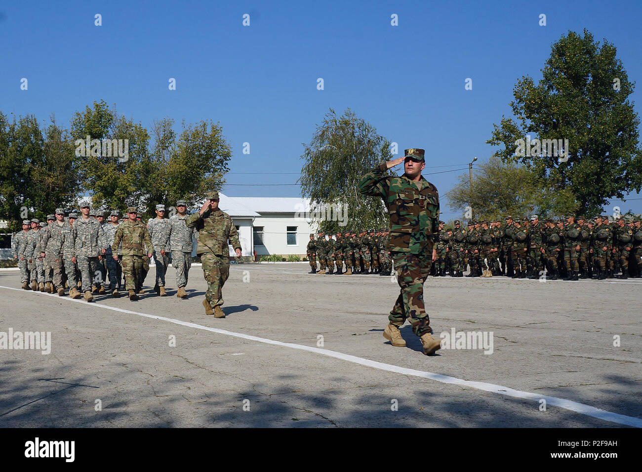 A Moldovan Army leader, right, and North Carolina National Guard ...